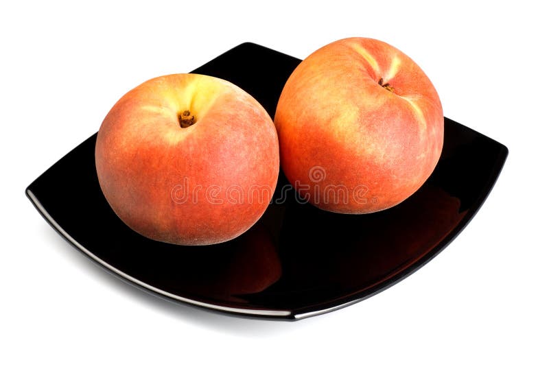 Red peaches on black dish stock photo. Image of juice - 11258310