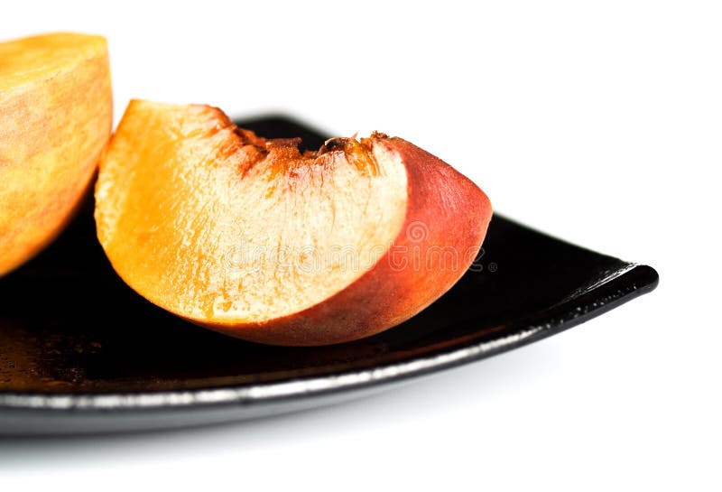 Red Peaches Slices on Black Dish Stock Photo - Image of fresh, apricots ...