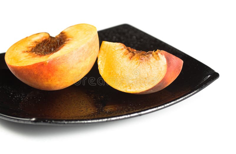 Red Peaches with Pip on Black Dish Stock Photo - Image of peaches ...