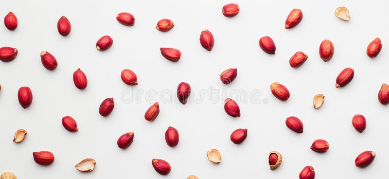 Red Peanuts Scattered on White Background, Showcasing Natural Textures ...