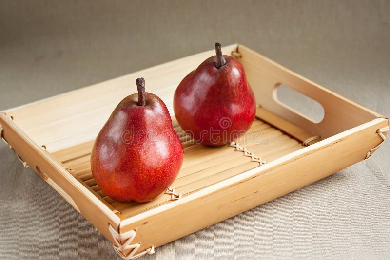Red pears stock photo. Image of tray, basket, wooden - 13940584