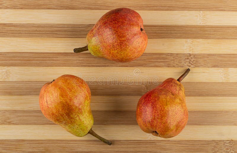 Red Pears on Bamboo Table. Top View Stock Image - Image of view ...