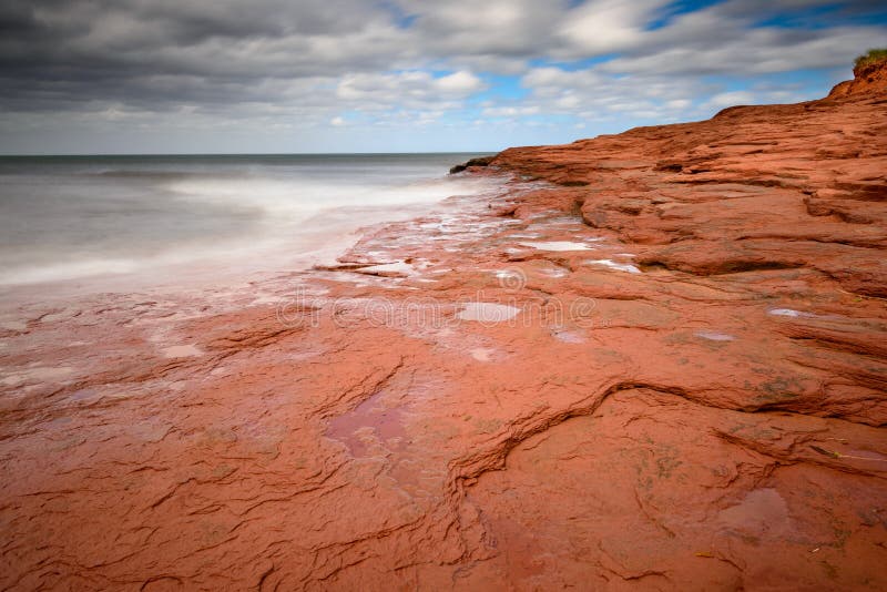 Red PEI Shore As Hurricane Approaches Stock Image - Image of sand, rain ...