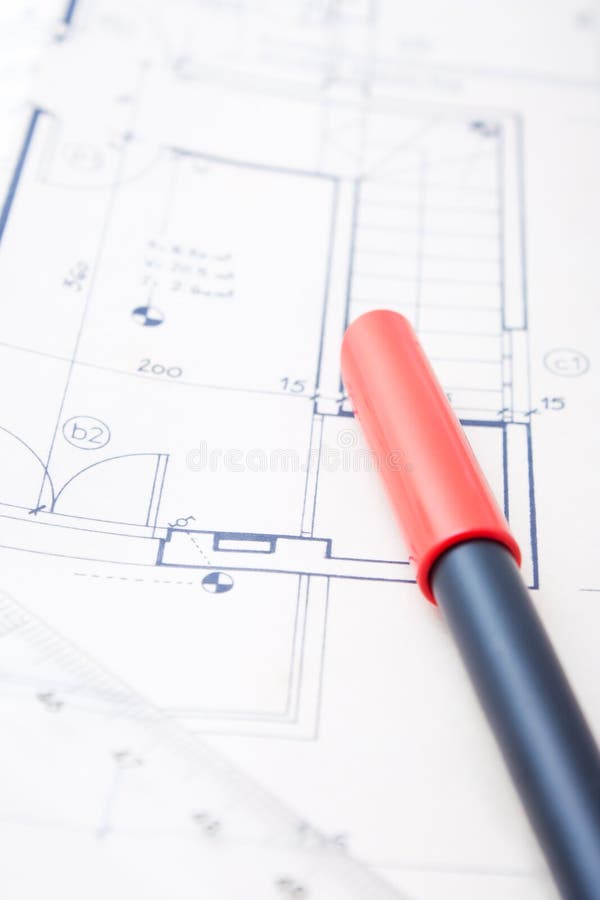 Red pen and blueprints stock photo. Image of instrument - 21483556