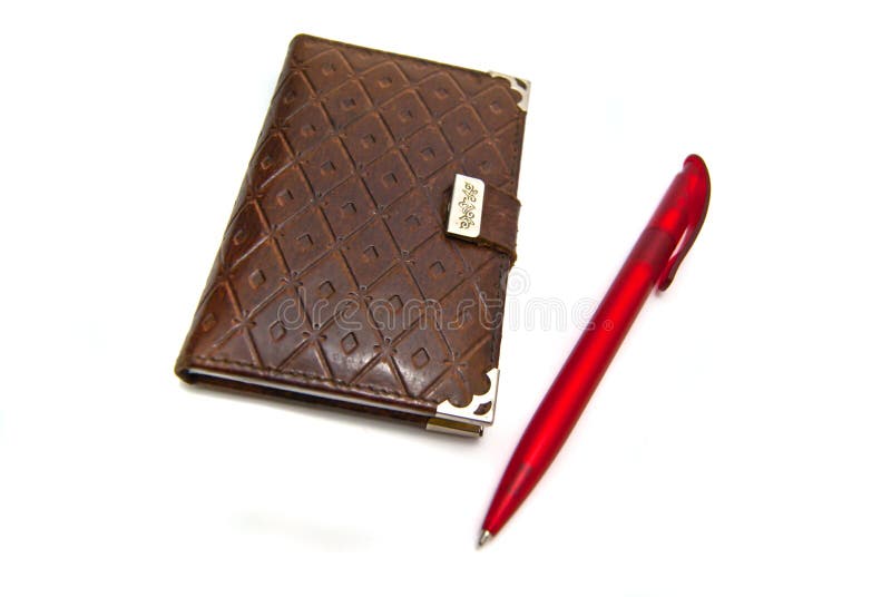 Red pen and notebook stock photo. Image of stationery - 28438408