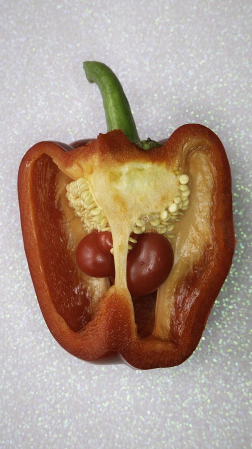 Red Pepper Cut in Half with Small Paprika Inside,white Background. Copy ...