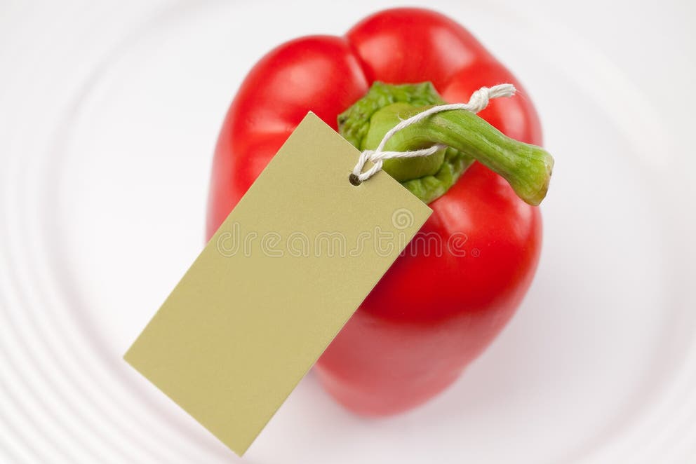 Red pepper with label stock image. Image of closeup, health - 12516035