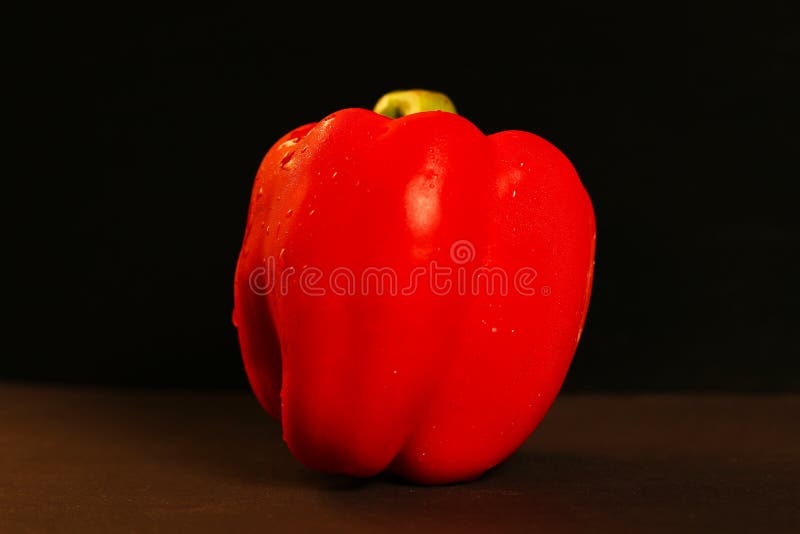 Red pepper on the table stock photo. Image of shadows - 135343072