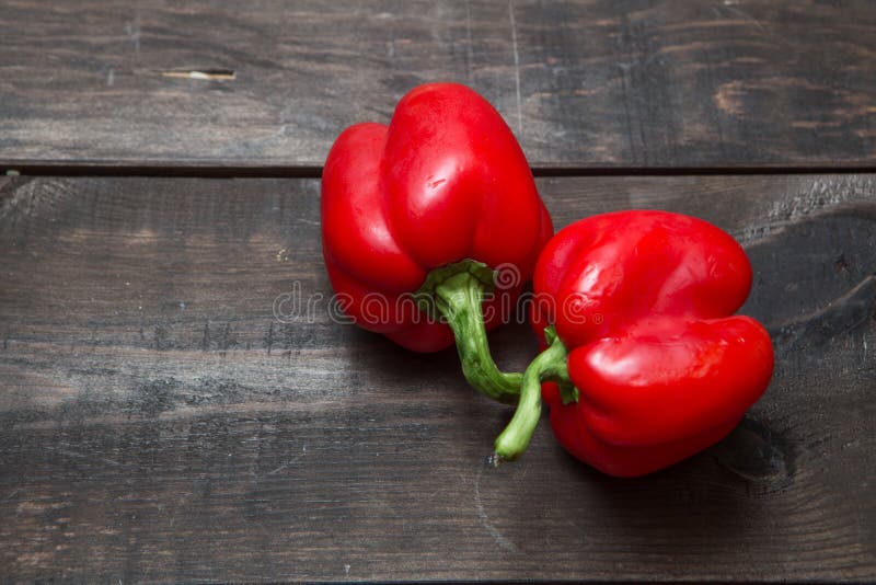 Red pepper on wood stock photo. Image of freshness, shadow - 83905354