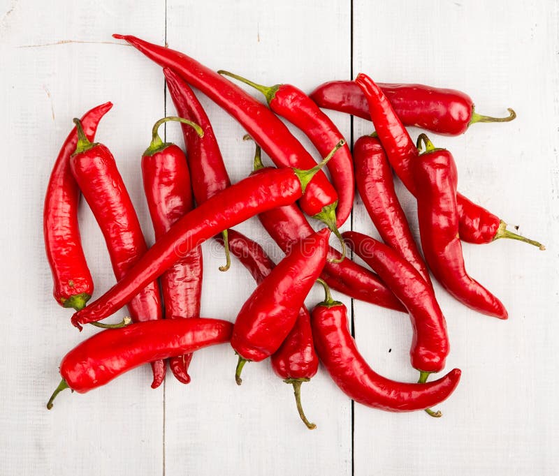 Red Pepperoni Peppers on Wooden Table Stock Image - Image of chili ...
