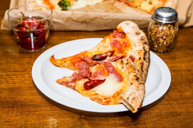 Red Peppers on Slices of Pizza Stock Image - Image of sauce, eating ...