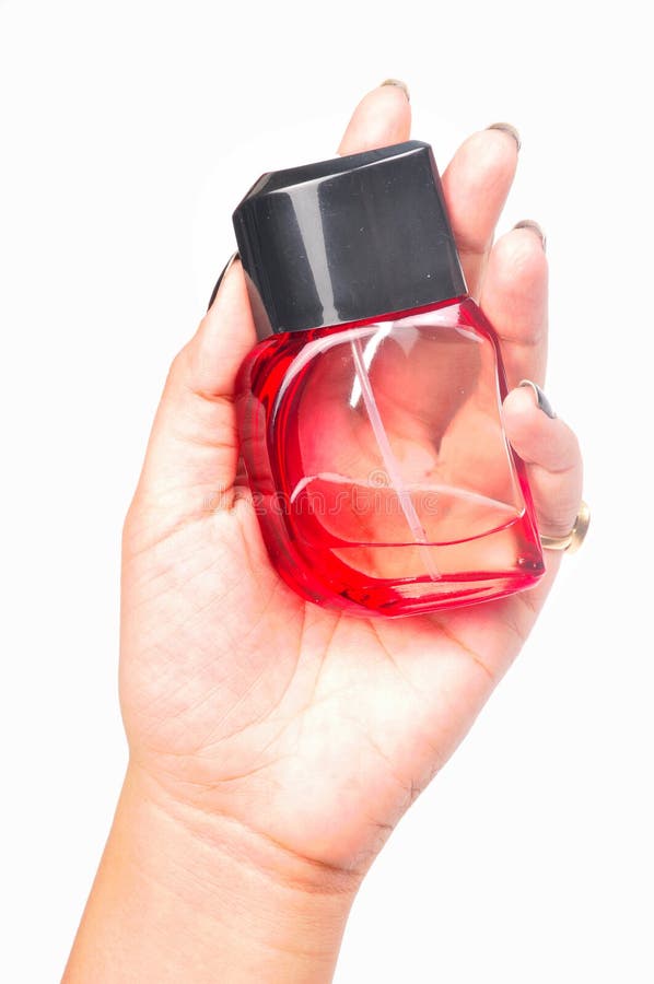 Red perfume bottle stock image. Image of cosmetics, hand - 9705043