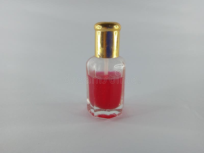 Red Perfume with Gold Cap on White Background Stock Image - Image of ...
