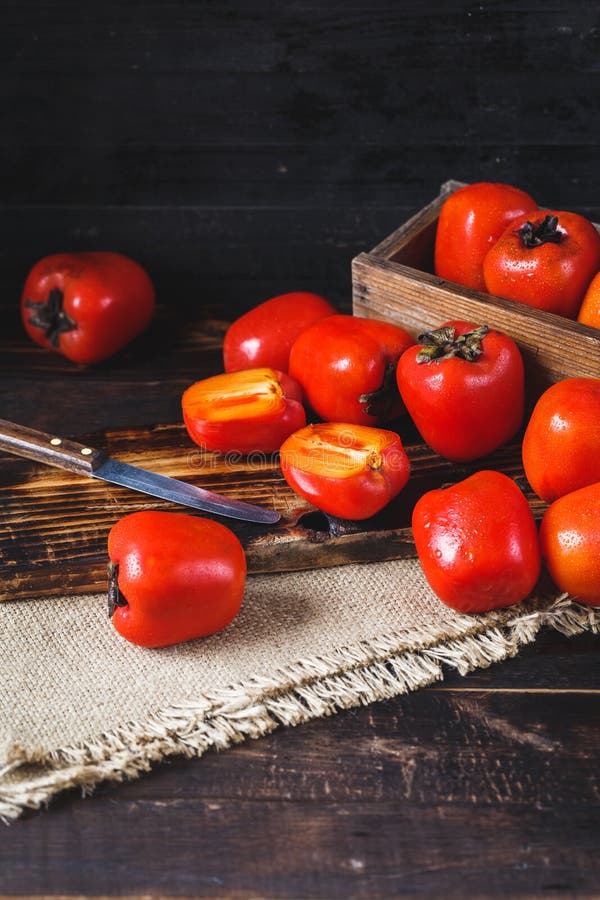 Red Persimmons stock photo. Image of sunlight, nature - 83276088
