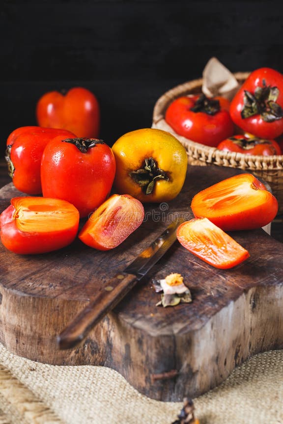 Red Persimmons stock image. Image of wood, tasty, nutrition - 83291429