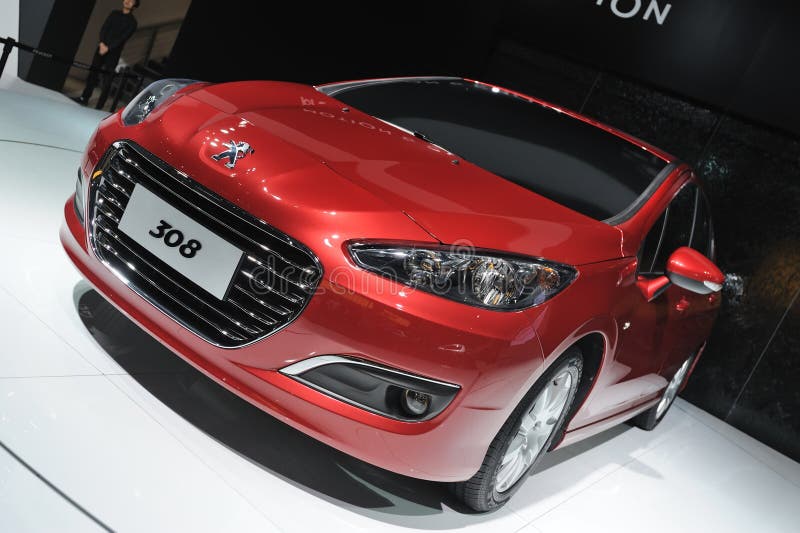 Red Peugeot 308 editorial photography. Image of horses - 25877517