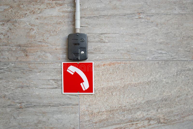 Red Phone Sign and Intercom on Marble Wall Stock Photo - Image of ...
