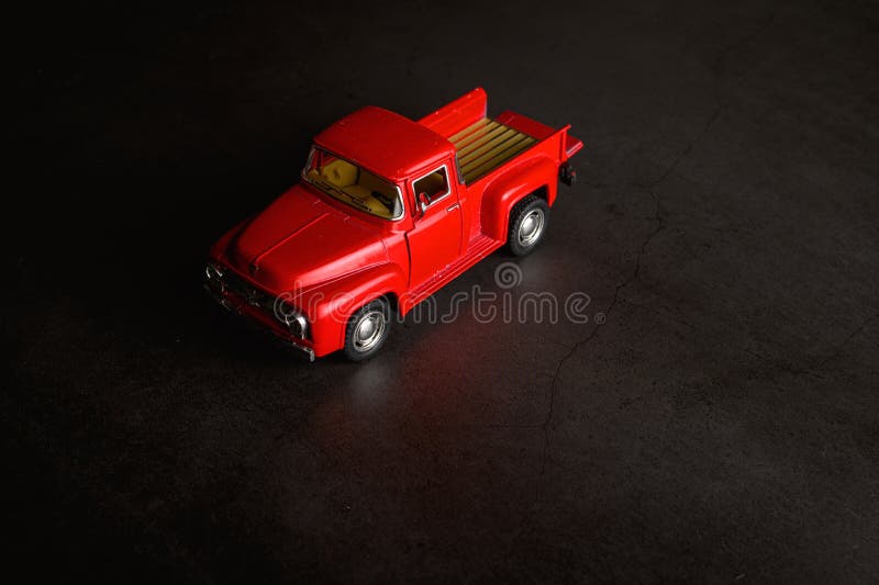 Red Pickup Model on the Black Floor Stock Photo - Image of vehicle ...