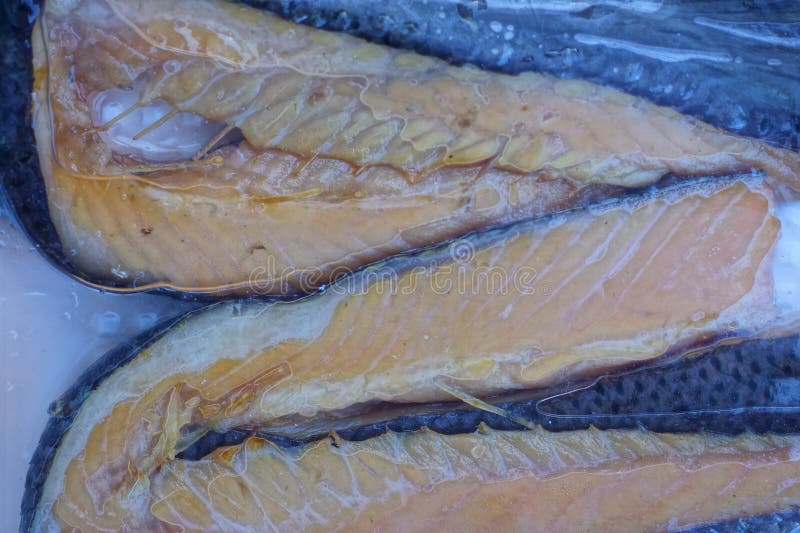 Red Pieces of Fish Salmon in Cellophane Transparent Packaging Stock ...