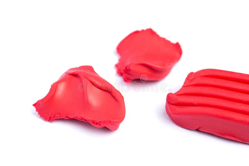 Red Pieces of Plasticine on a White Background. Stock Image - Image of ...