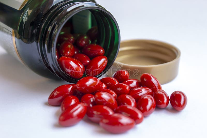 Red Pills Outside Its Green Bottle Stock Photo - Image of pharmacy ...