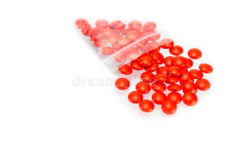 Red Pills Whit Plastic Bag in White Background Stock Photo - Image of ...