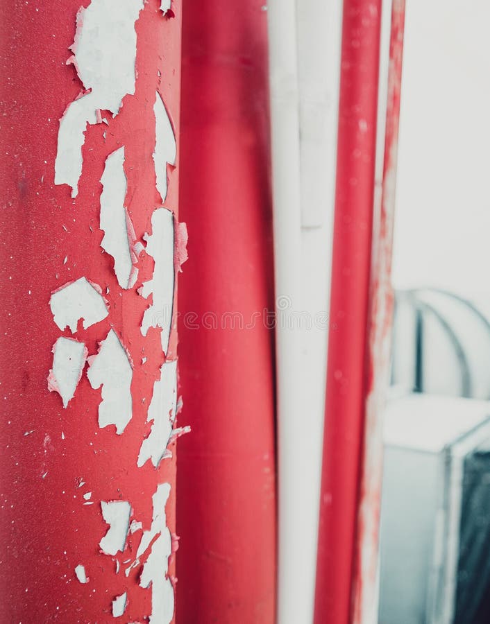 Red Old Scraped Paint Pipe on the Rooftop Stock Photo - Image of ...