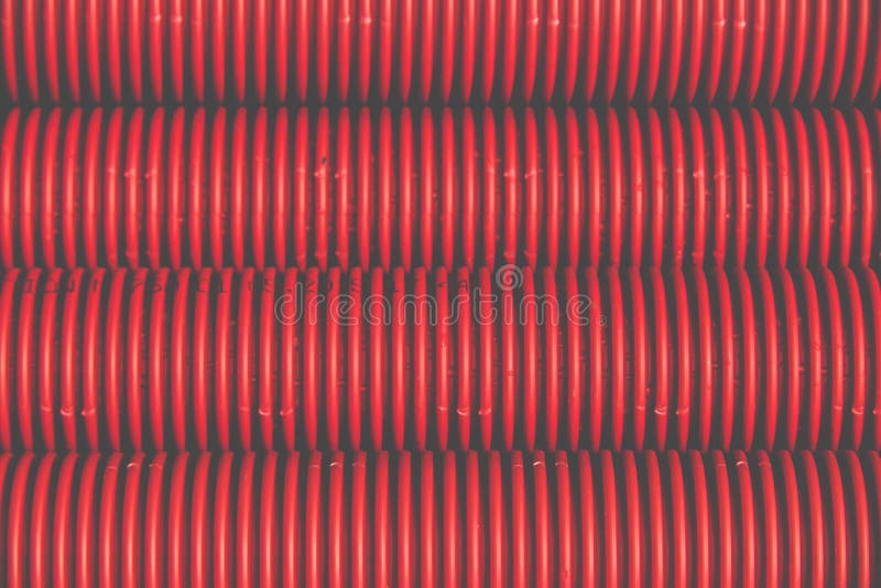 Red pipes background stock photo. Image of cable, piece - 152498596