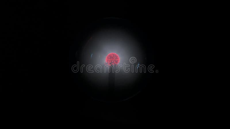 Red Plasma Ball Glowing in the Dark, Creating a Captivating Visual ...