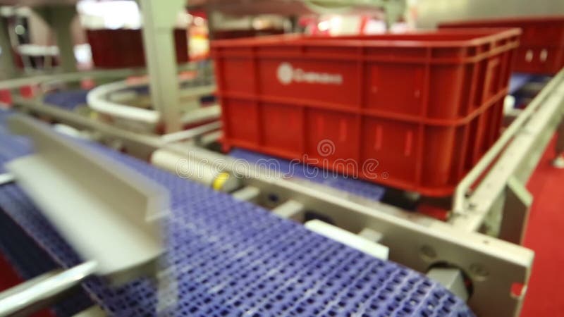 Red Plastic Boxes Move on Two Blue Industrial Stock Video - Video of ...