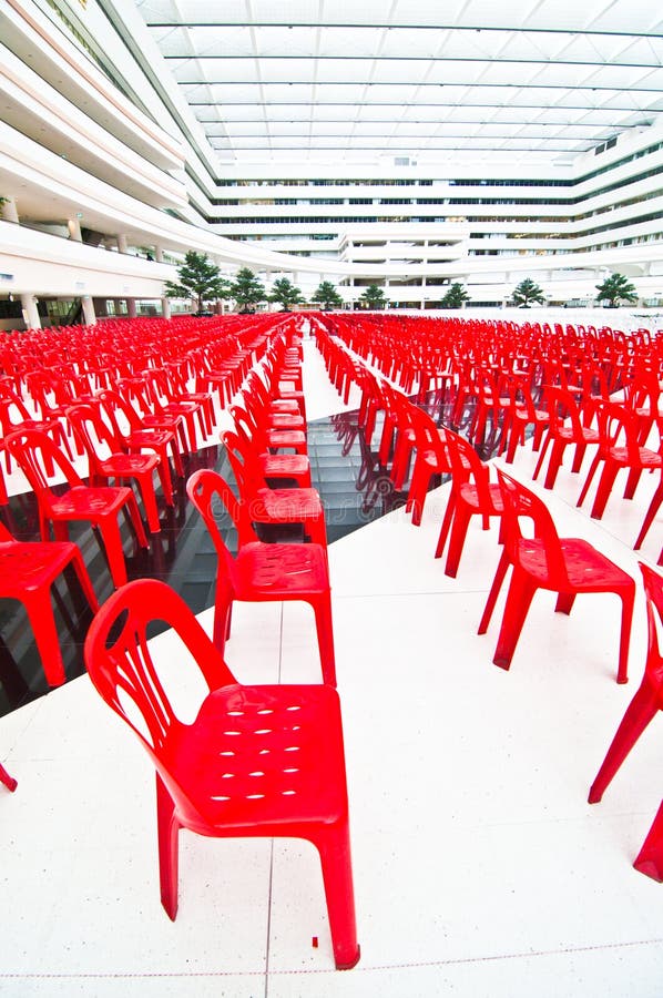Red plastic chairs stock image. Image of carpet, classroom - 21227463