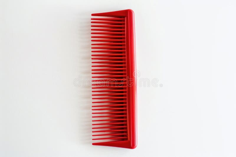 A Red Plastic Comb Isolated on a White Background Stock Photo - Image ...