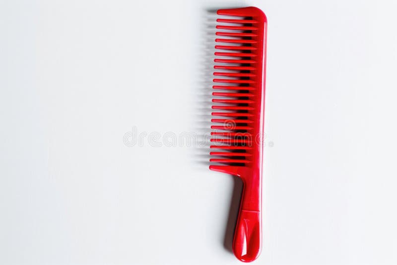 A Red Plastic Comb on a White Background Stock Photo - Image of durable ...