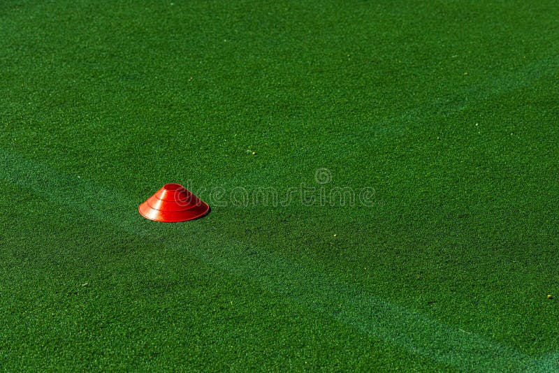 Red Plastic Cone on a Fooball Field Stock Image - Image of play, field ...
