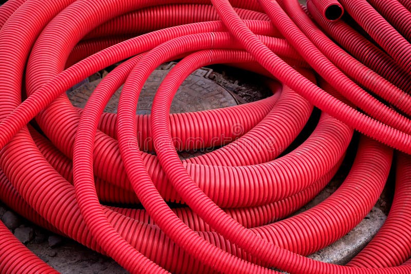 Red Plastic Corrugated Pipe for Installation of Communications and ...