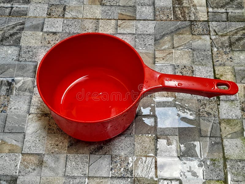 Red Dipper Plastic Serves As a Water Container Stock Photo - Image of ...