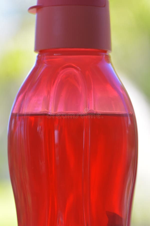 Red Plastic Drinking Bottle Stock Image - Image of curve, ribs: 140099707