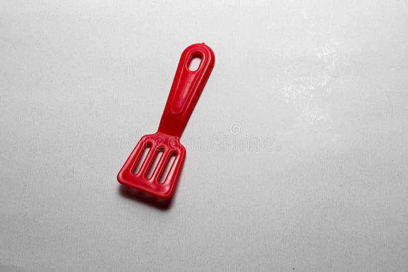 Red Plastic Food Ladle - Kids Toys Stock Photo - Image of kids, pottery ...