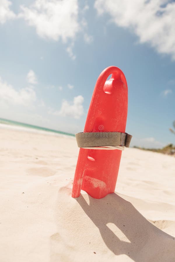 Red Plastic Life Guard Tube, on the Beach. Stock Photo - Image of rest ...