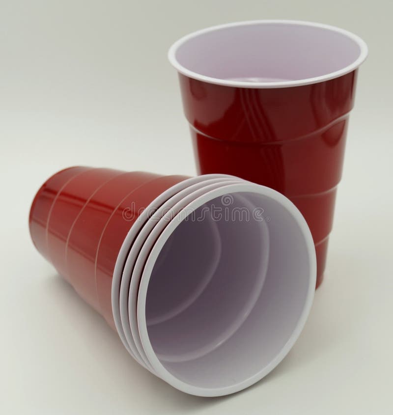 2 Plastic Red Party Cups on a Table. One on Its Side. Stock Image ...