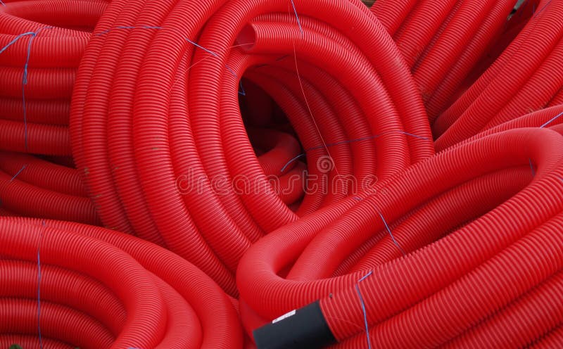 Red plastic pipes stock image. Image of build, striped - 731821