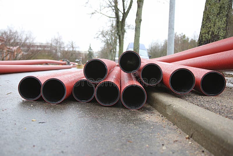 Red plastic pipes stock image. Image of pipework, outdoor - 87395135