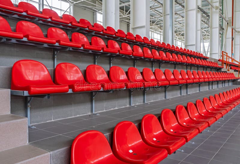 Red Plastic Seats in the Stadium. Tribune Fans Stock Image - Image of ...
