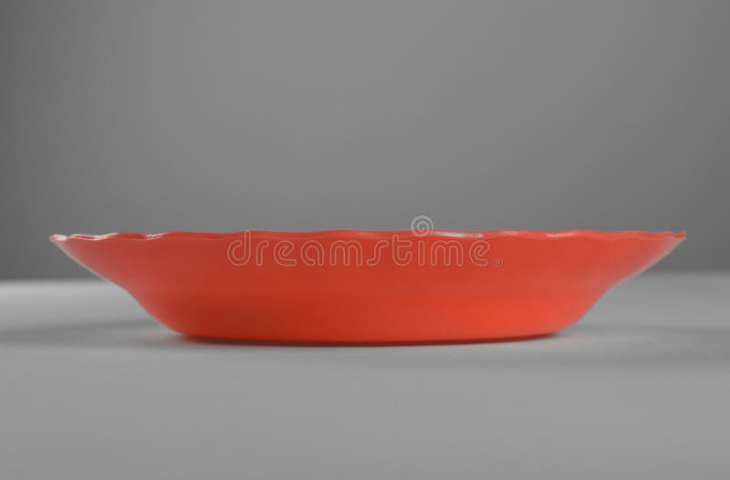 Red plastic shallow dish stock image. Image of flat, plain - 86487035