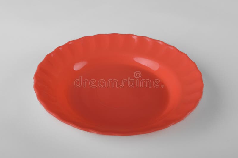Red plastic shallow dish stock image. Image of solid - 86487057