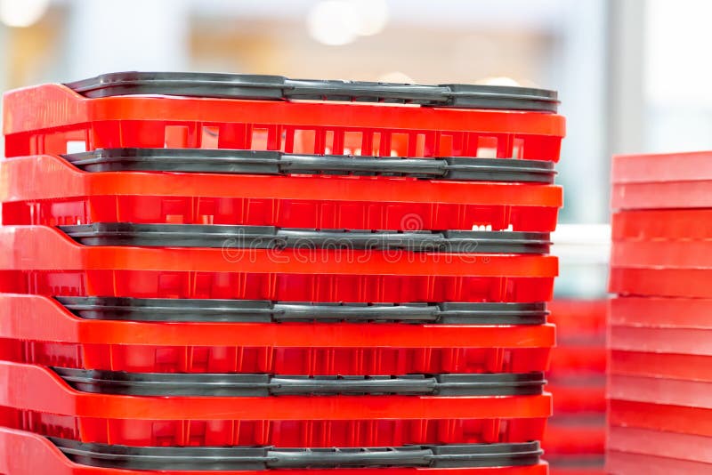 Red Plastic Shopping Baskets in the Supermarket Store Stock Photo ...