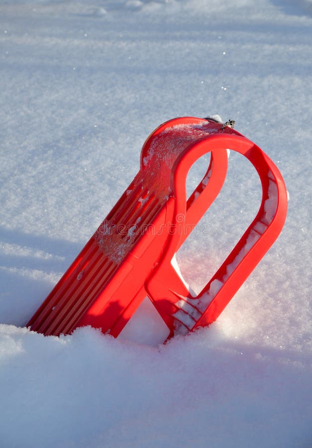 Red Plastic Sled in Deep Snow Stock Image - Image of childhood ...