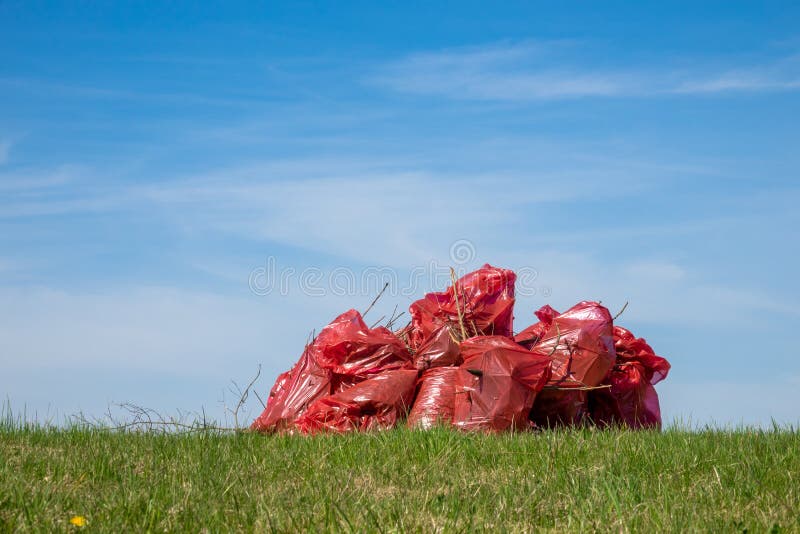 Red Plastic Trash Bags Full of Garbage Stock Image - Image of junk ...