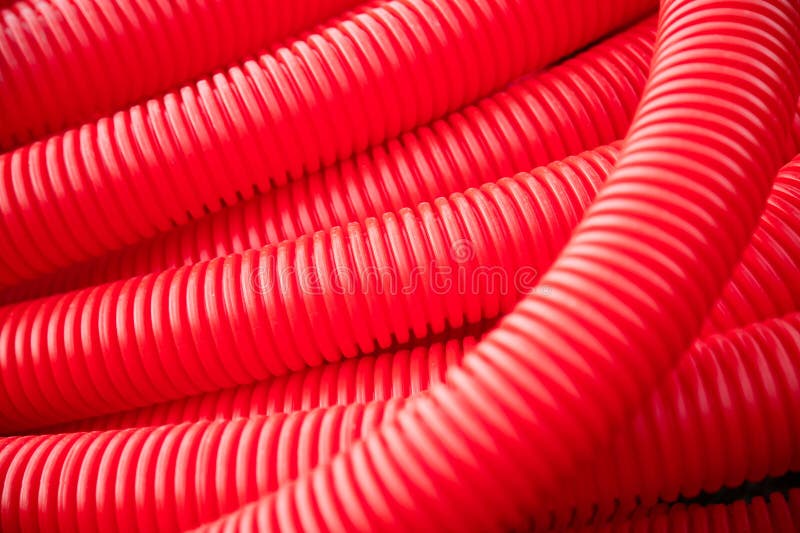 Red Plastic Tubing for Underground Cable Protection As Background Stock ...