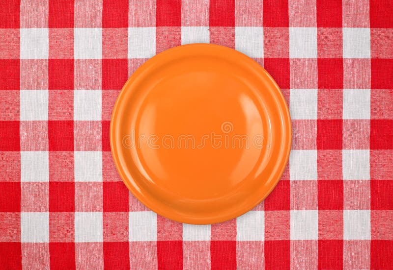 Red Plate on Checked Tablecloth Stock Photo - Image of checkered ...